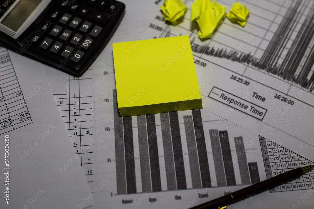 Calculator, pen, graph, white background Stock Photo | Adobe Stock