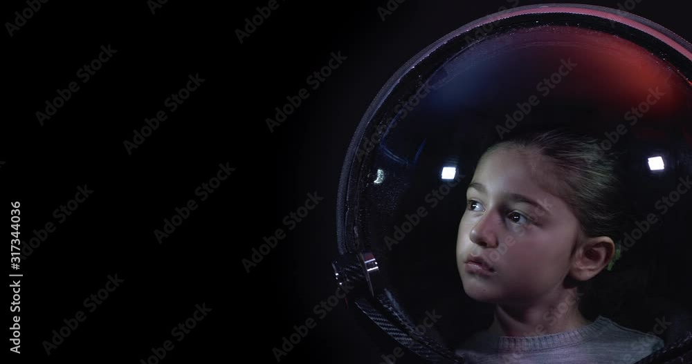 Brave Beautiful Little Girl Astronaut In Space Helmet Looking At ...