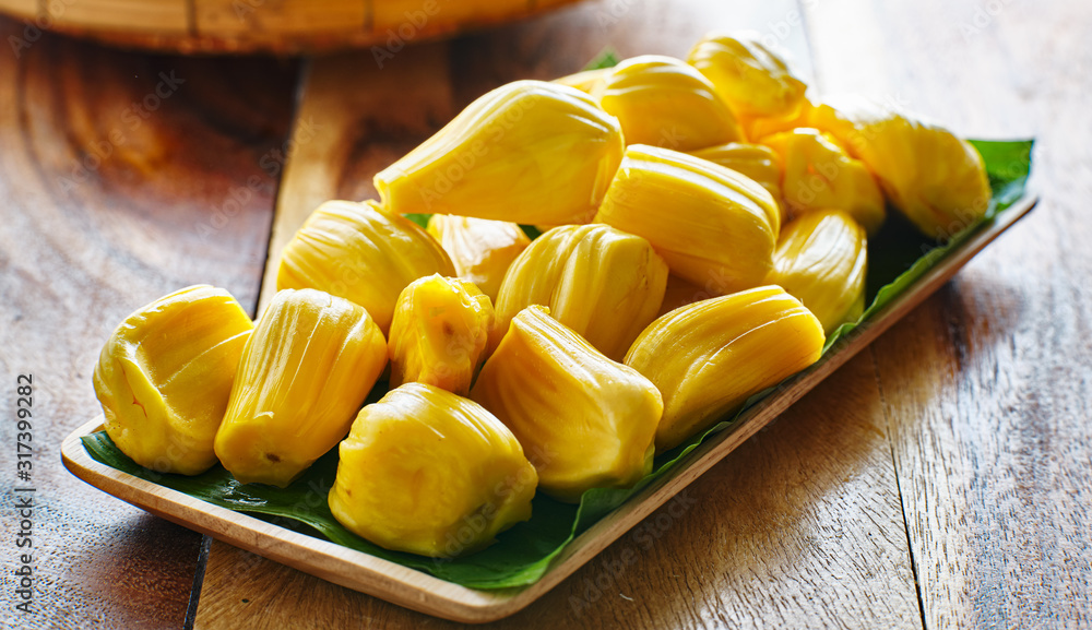 pile of peeled jackfruit on banana leaf serving tray, Stock Photo ...