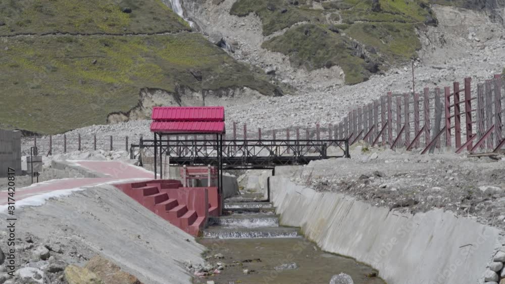 Pathway of Kedarnath Temple.Beautiful pathway, flowing Himalaya fresh ...