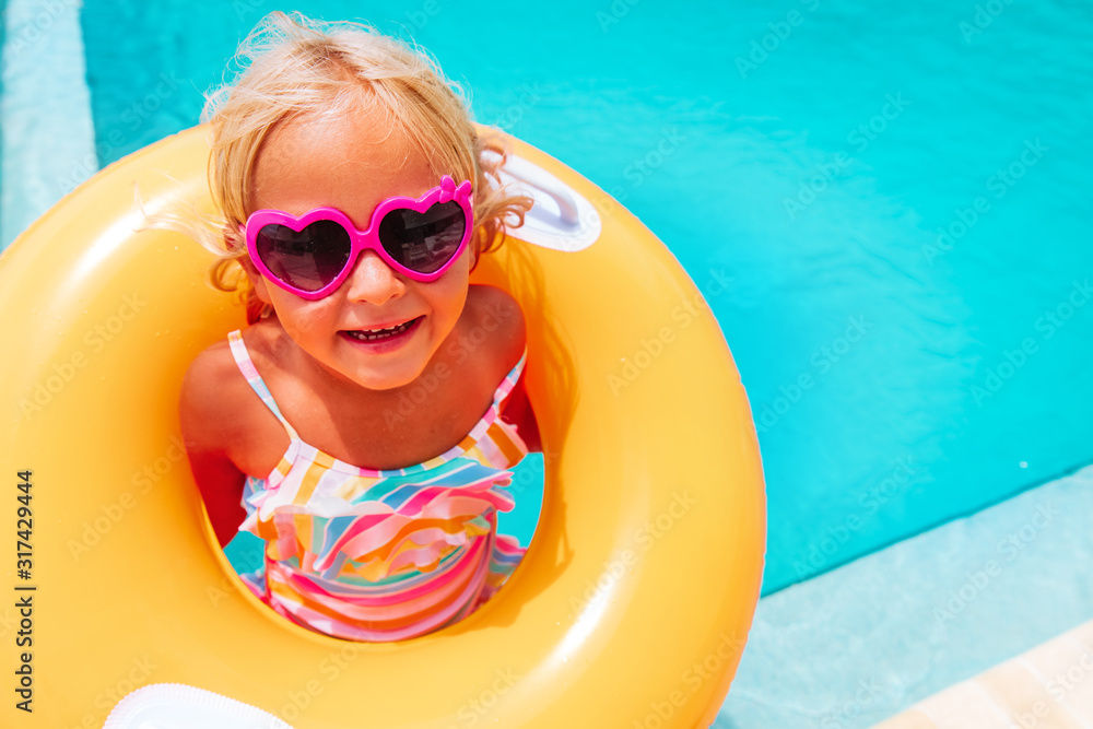 cute happy little girl have fun at the pool Stock Photo | Adobe Stock