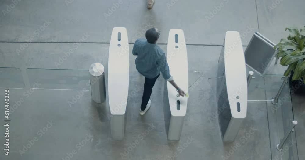 Overhead shot of security gates identifying people at entrance Stock ...