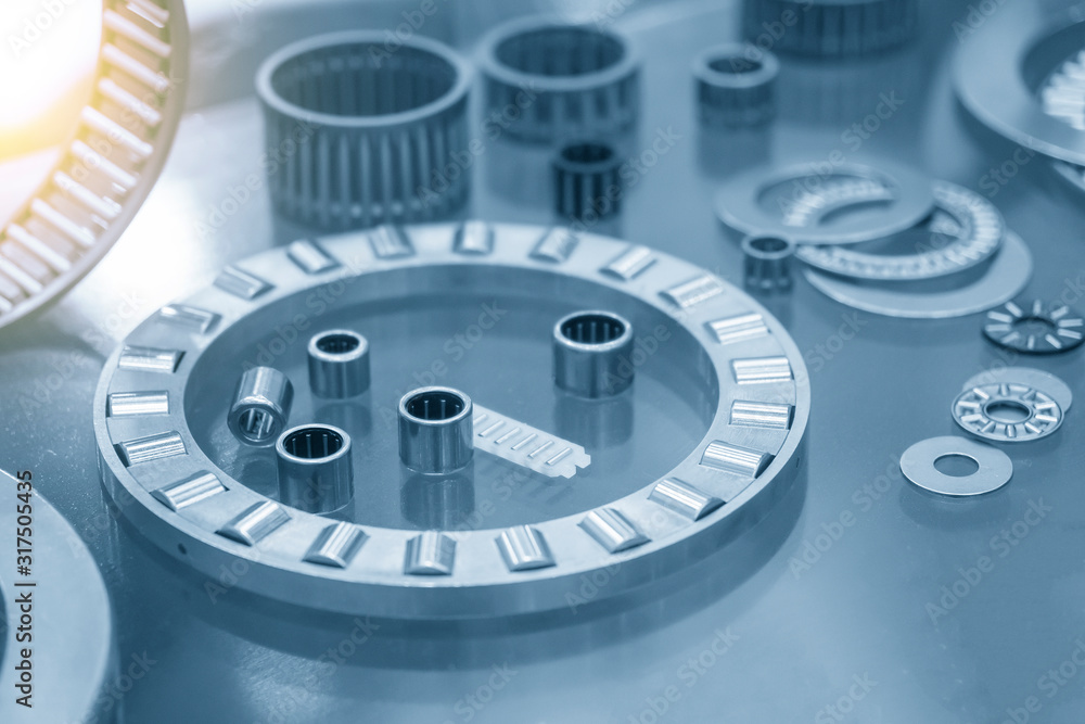 Various type of bearing spare part with the lighting effect. The needle ...