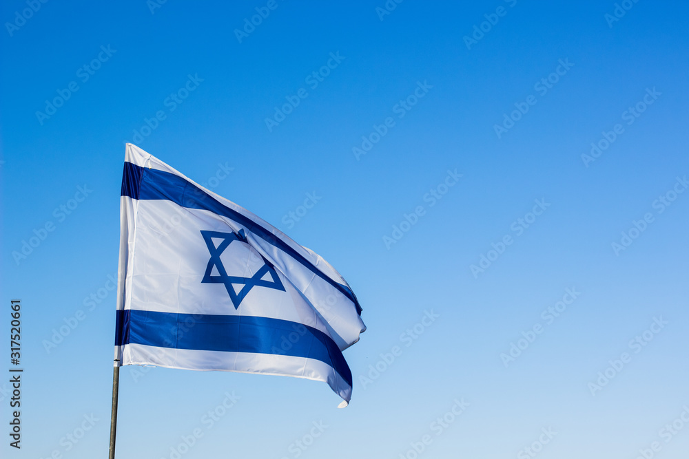 Israeli flag with star of David national symbol fluttering on empty ...