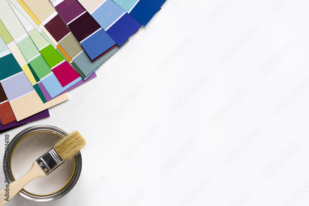 Paint color chart sample swatches, paint brush and tin of paint ...