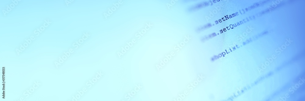 Application source code on notebook blue screen background. Software ...