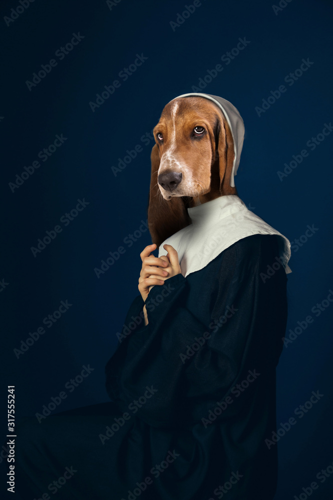 Hope and faith. Medieval young woman as a nun in vintage clothing and ...