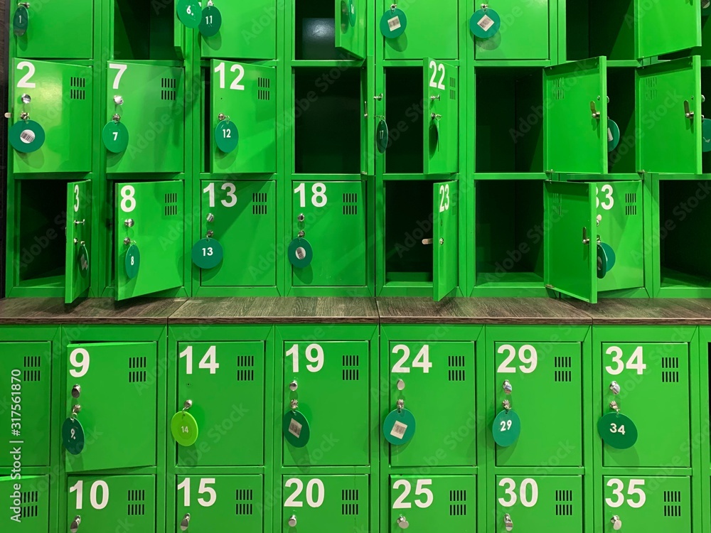 Background texture: green lockers in the locker room. Lockers in a ...
