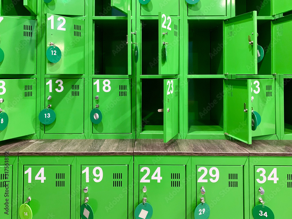 Background texture: green lockers in the locker room. Lockers in a ...