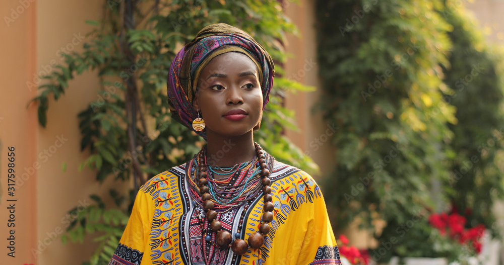 Close up of the face of the pretty young African woman in the ...
