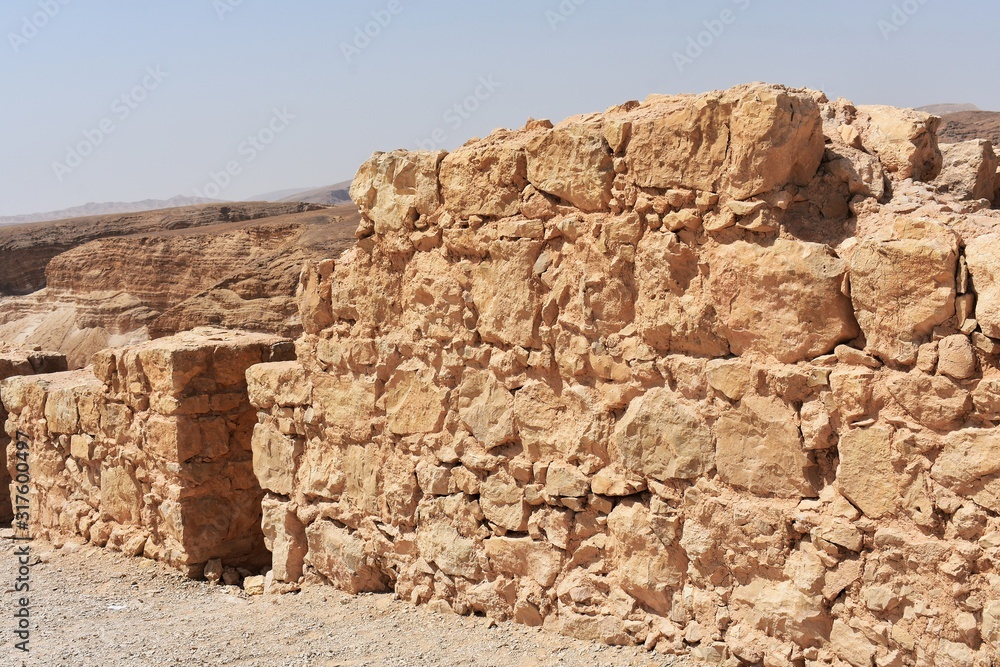Ruins of the ancient Masada, a mountaintop fortress, near the Dead Sea ...