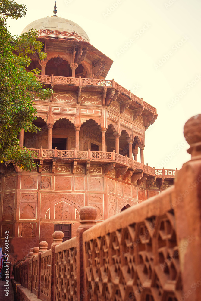 Taj Mahal is an ivory-white marble mausoleum on the south bank of the ...