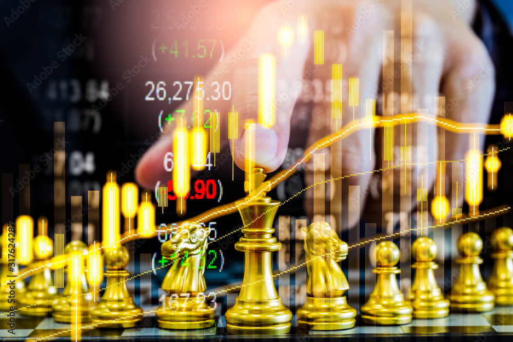 Chess game on chess board on stock market or forex trading graph chart ...