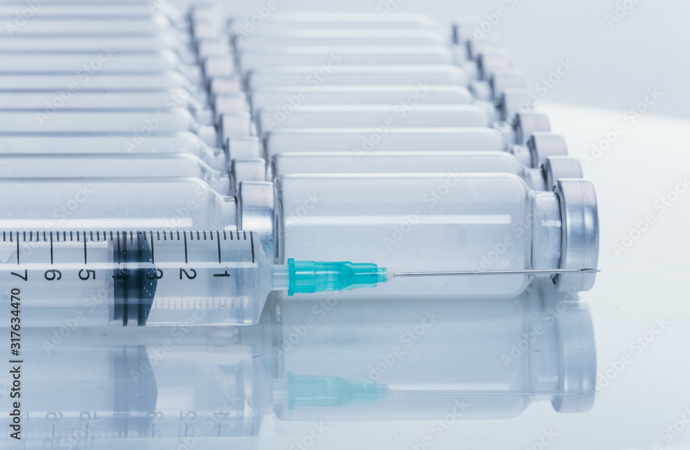 Medicine, Injection, vaccine and disposable syringe, drug concept ...