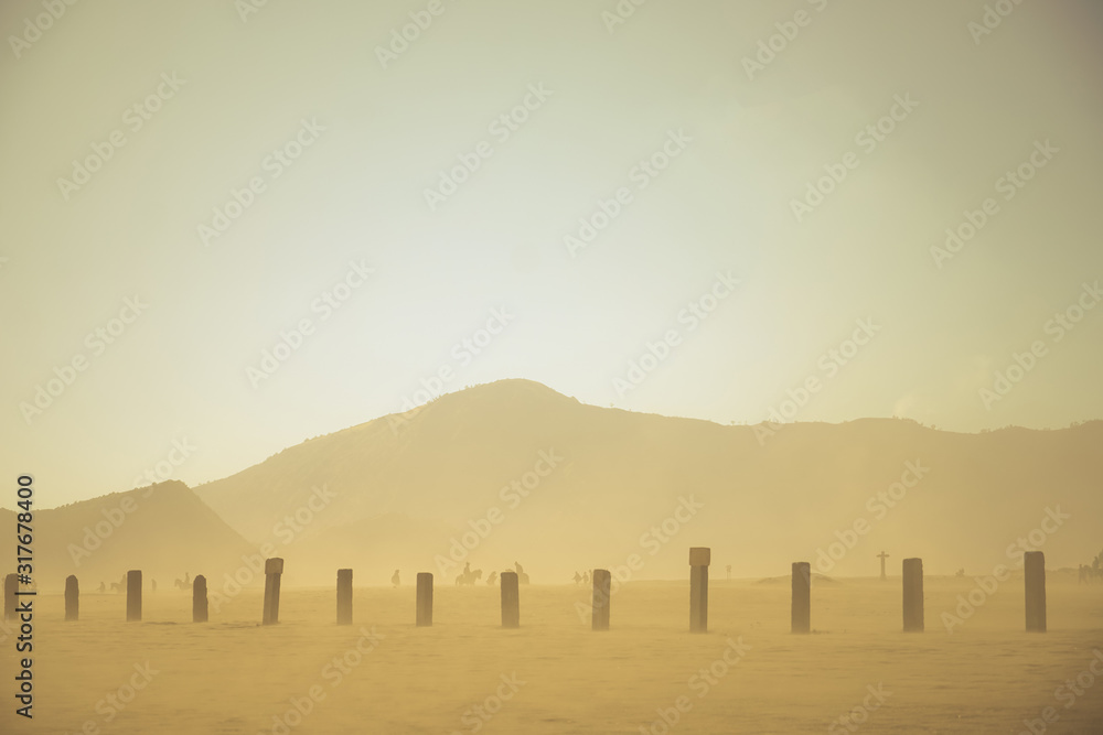 Dust and Sandstorm in desert, Light shines through the rising grains of ...