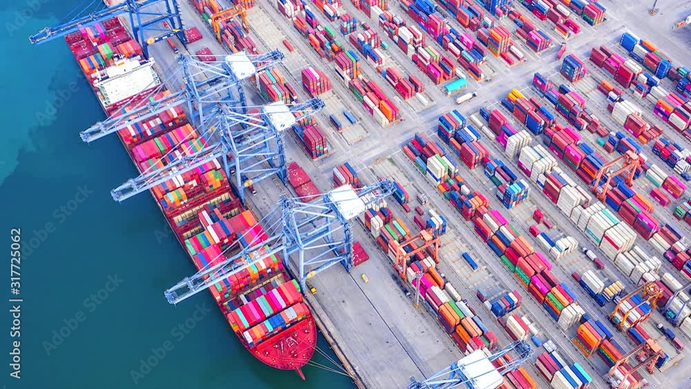 4K Time lapse industrial port with containers from top view or aerial ...
