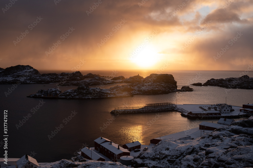 typical lofoten islands view. fishin town with mountains in backround ...