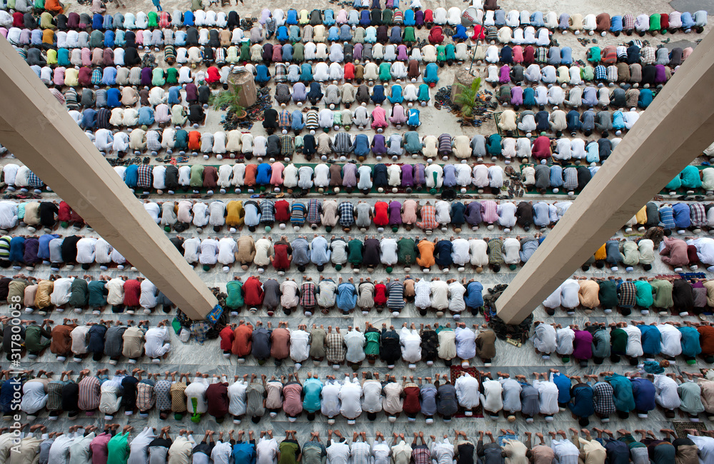 Large group of Muslim people praying Stock Photo | Adobe Stock