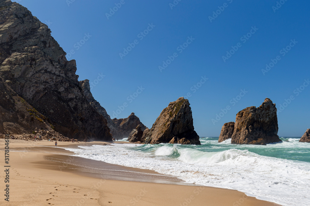 Scenic view of rugged and dramatic coastline with huge boulders at the ...