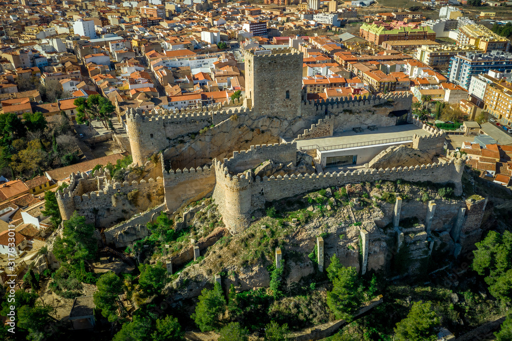 Aerial view of medieval Almansa castle with donjon and courtyard on a ...