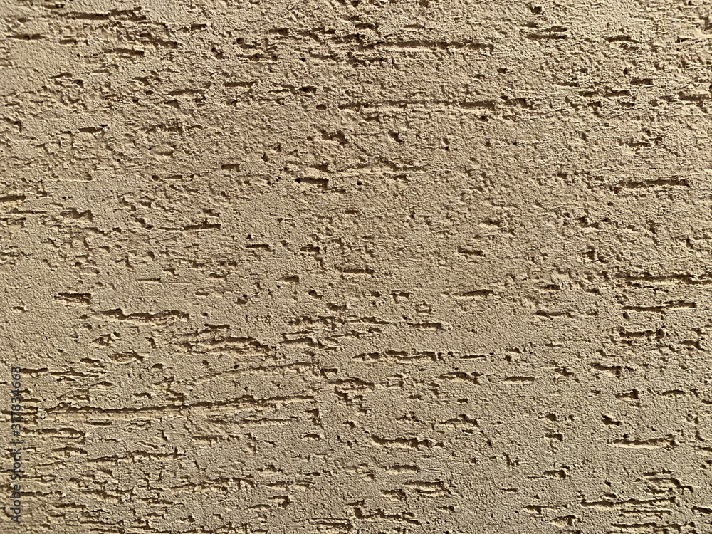 Foto de Bronze plaster Stucco surface with cracks, wall leveling during ...