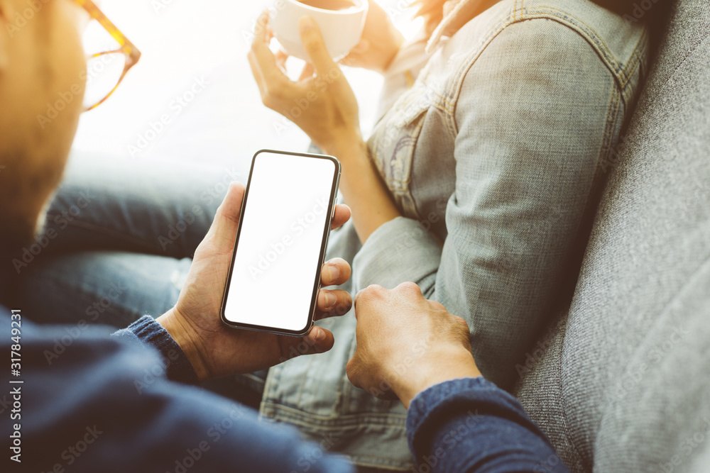 Mockup image blank white screen cell phone.hand holding texting using ...