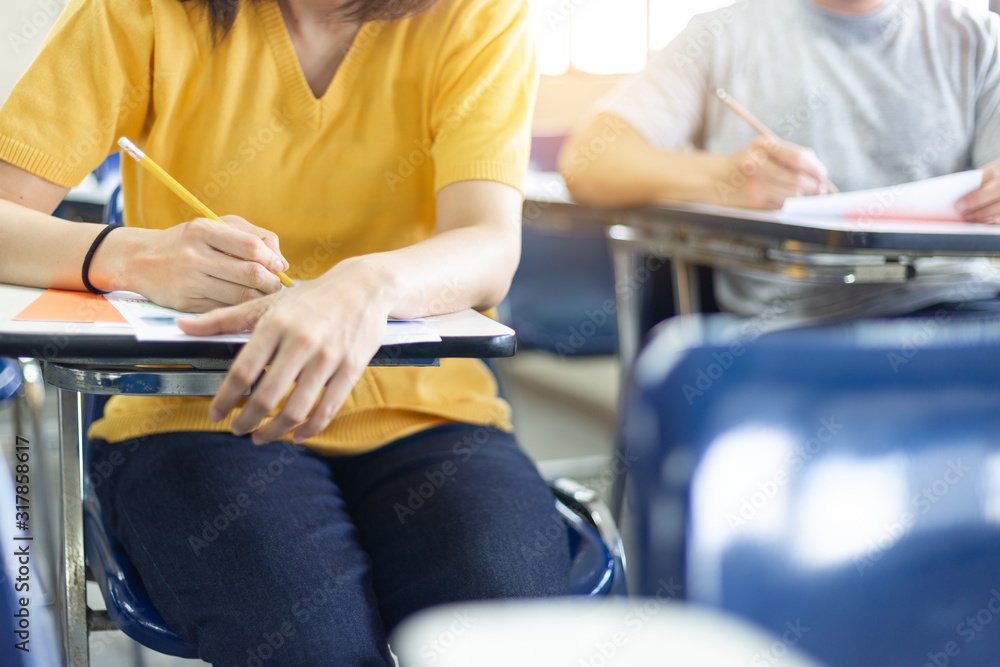 high school,university student study.hands holding pencil writing paper ...