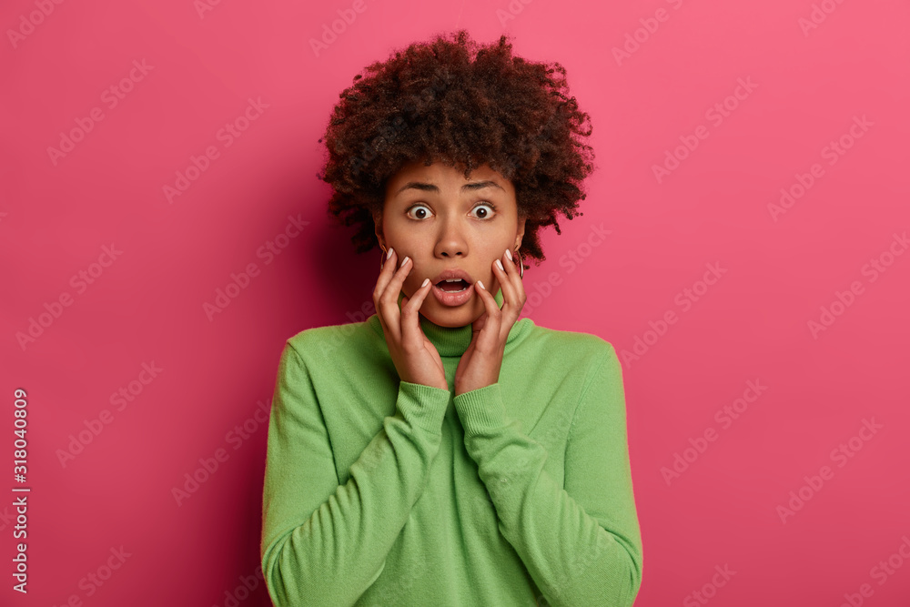 Human reaction and emotions concept. Stunned frightened woman keeps jaw ...