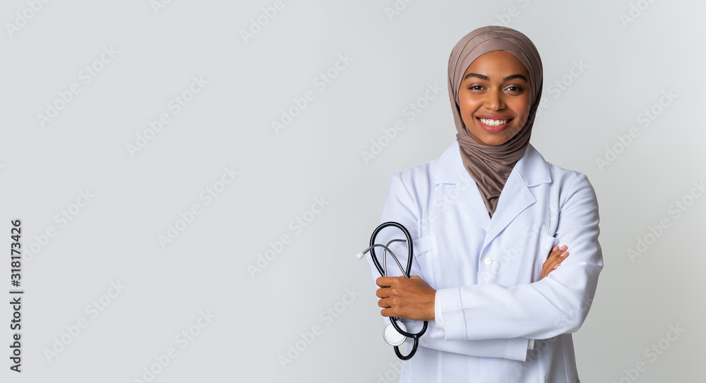 Portraif Of Black Islamic Female Doctor In Hijab Posing With ...
