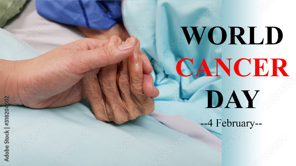 In World cancer day on 4 February, Doctor holding patient's hand in the ...