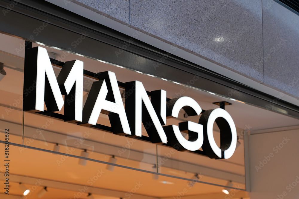 mango logo Spanish clothing store shop front sign in street Stock Photo ...