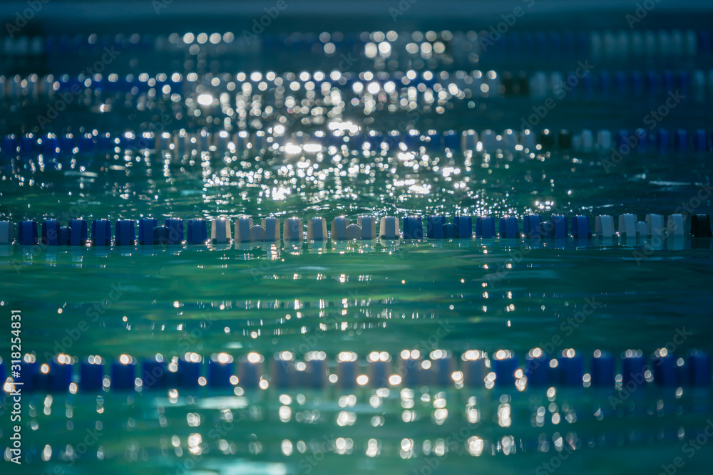 Swimming lane boundary in a pool, light reflections Stock Photo | Adobe ...