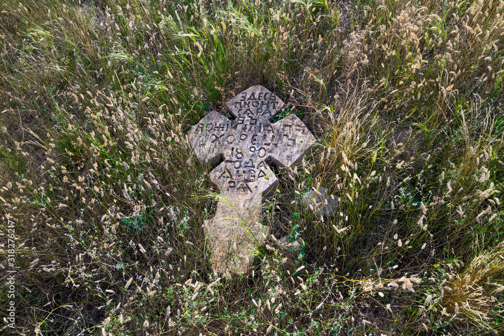 Stone tomb crosses on an ancient Christian necropolis of the 17th-19th ...
