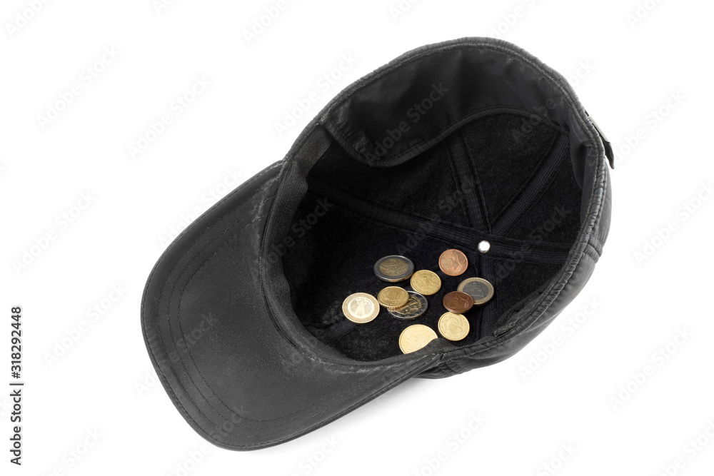 Cap with small change coins. The symbol of alms poverty in crisis or ...