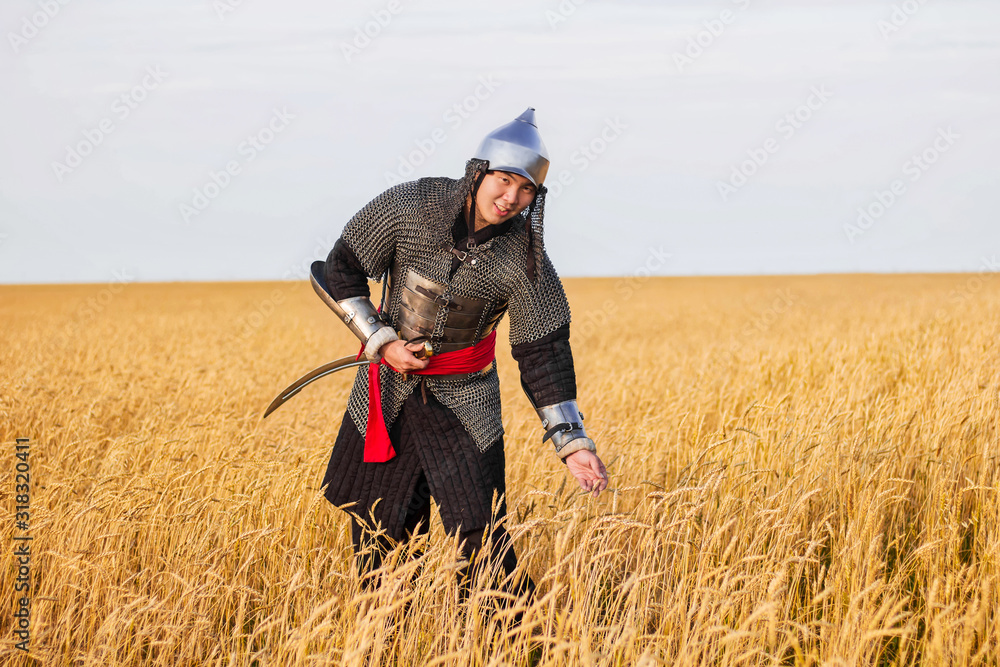 A nomad warrior in oriental armor with a saber and a helmet from the ...