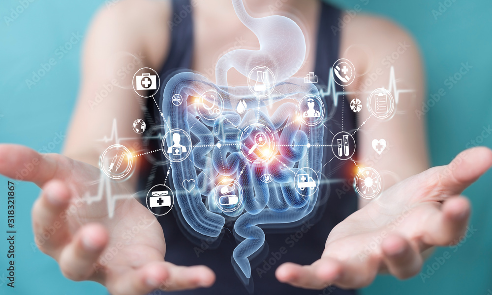 Woman using digital x-ray of human intestine holographic scan ...