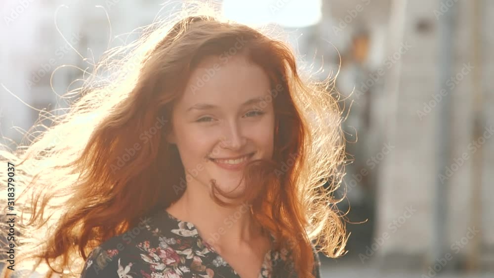 Portrait of Attractive and Beautiful ginger Woman having fun in front ...