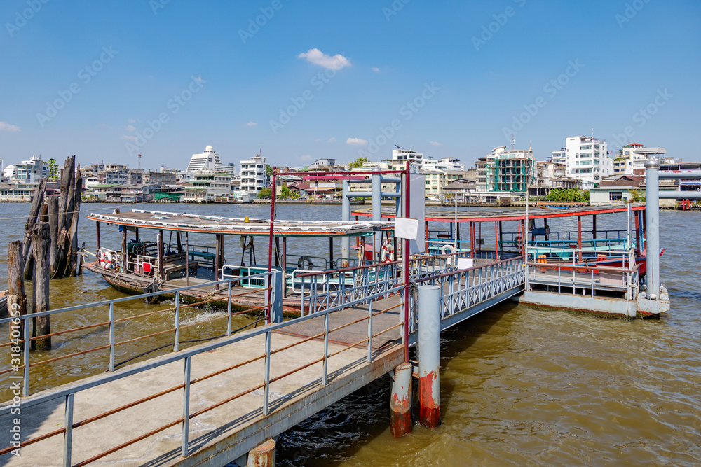 Outdoor sunny view of floating steel pontoon, pier or dock without ...