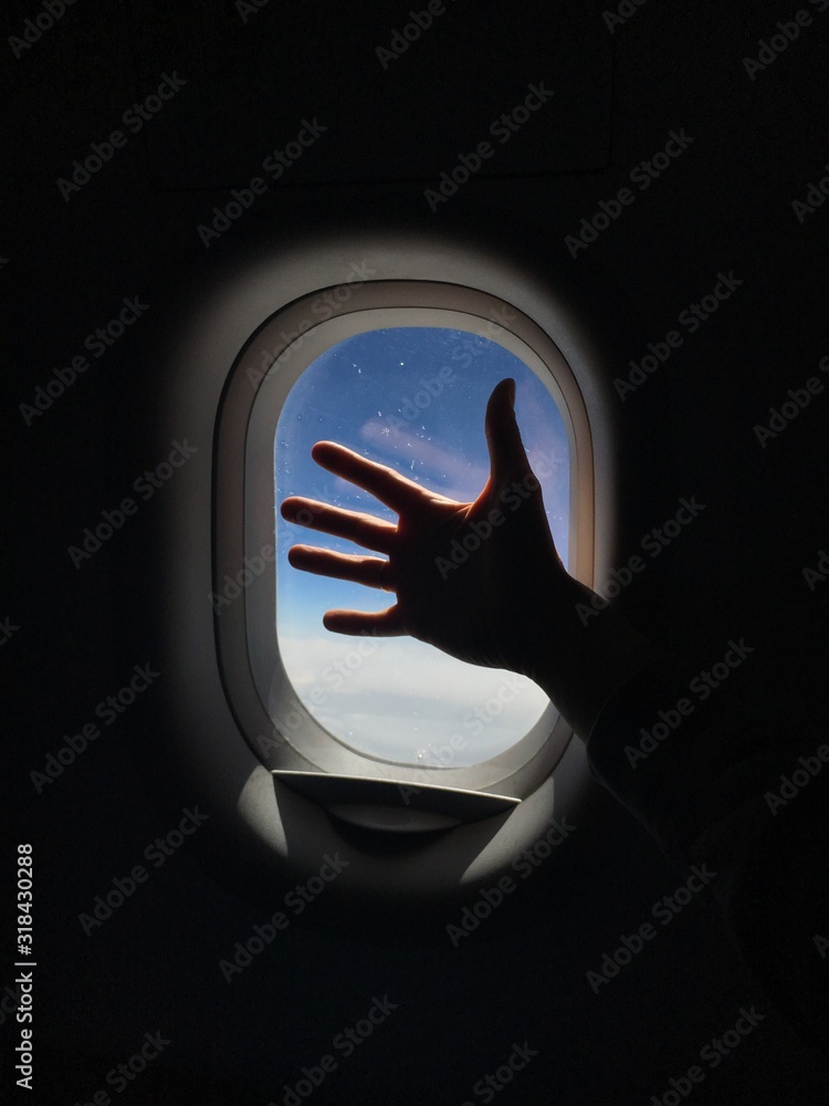 Silhouette Of Cropped Hand Showing Stop Gesture In Front Of Airplane ...