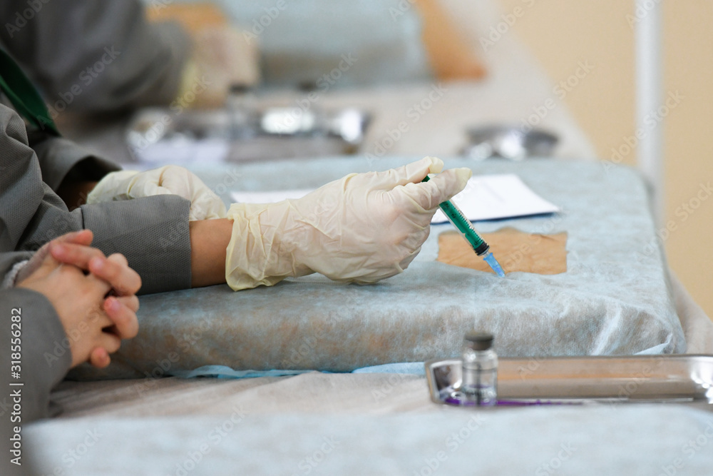 Learning to do injections. injection training. Teaching medicine ...