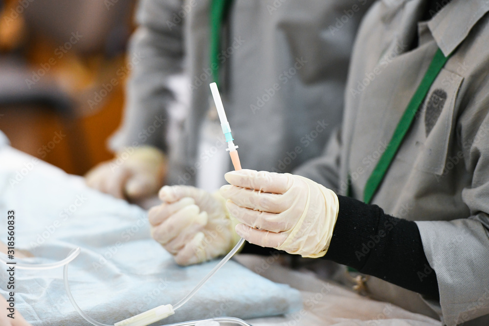 Learning to do injections. injection training. Teaching medicine ...