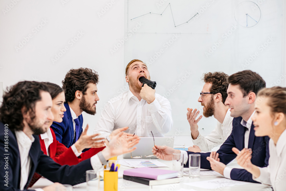 business meeting of young caucasian people, having trouble at work ...