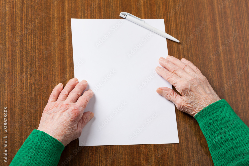 Old hands with blank paper Stock Photo | Adobe Stock