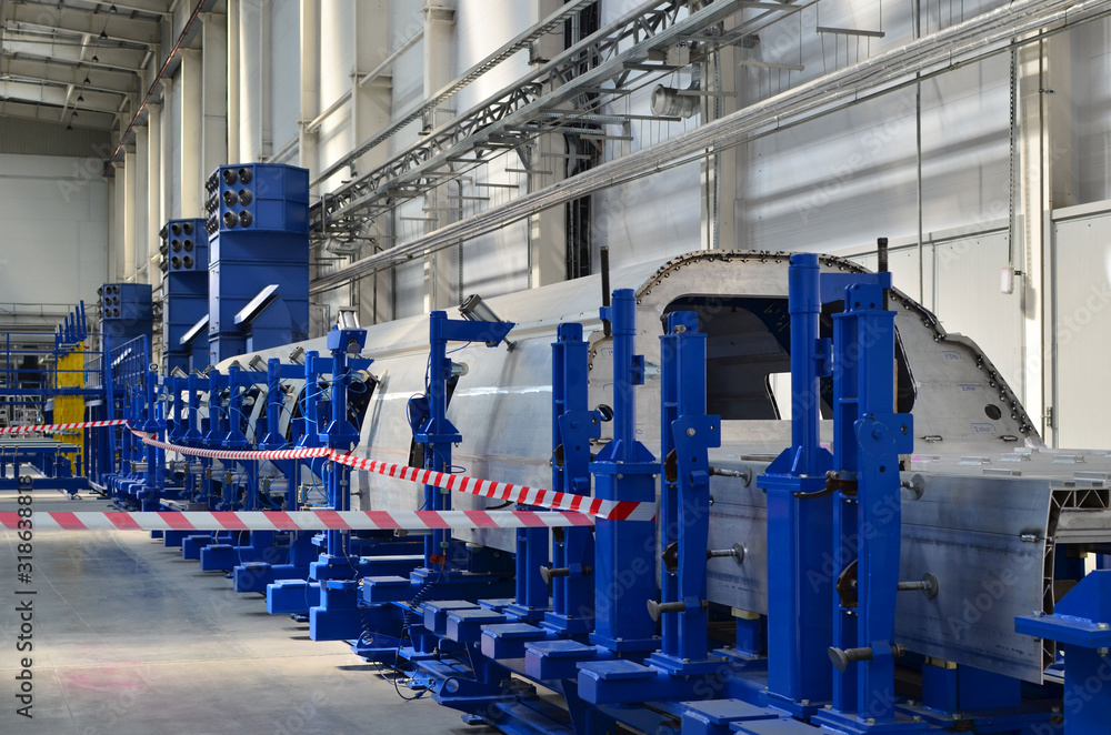 Inside of the rail car assembly plant. Industrial workshop for welding ...