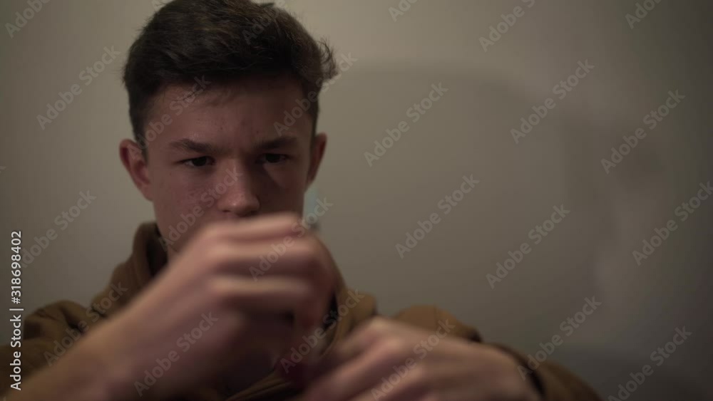 Close-up portrait of addicted Caucasian narcomaniac with brown eyes ...