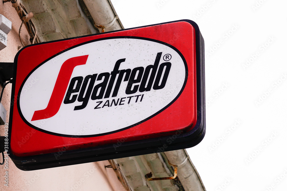 Segafredo Zanetti coffee sign logo on cafe wall Stock Photo | Adobe Stock