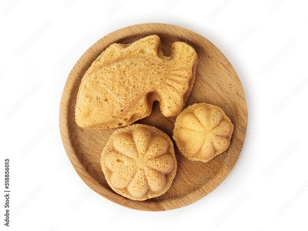 Traditional baulu cakes in Malaysia are called kuih bahulu in the form ...