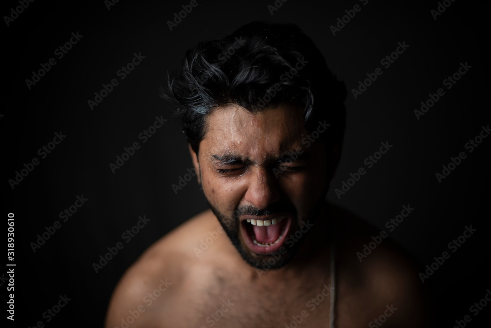 Portrait of young and handsome Indian Bengali brunette man in bare body ...
