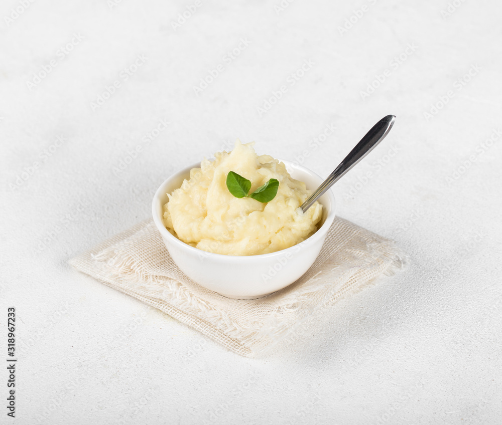 Mashed potatoes with greens on a light background in rustic style Stock ...