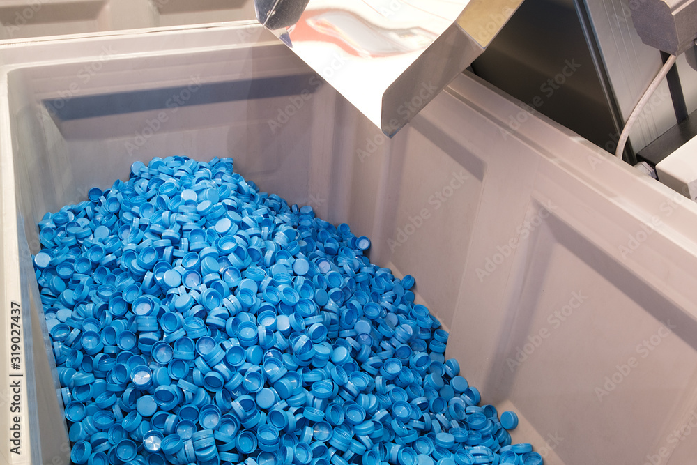 Plastic bottle caps background. Recycling collection and production ...
